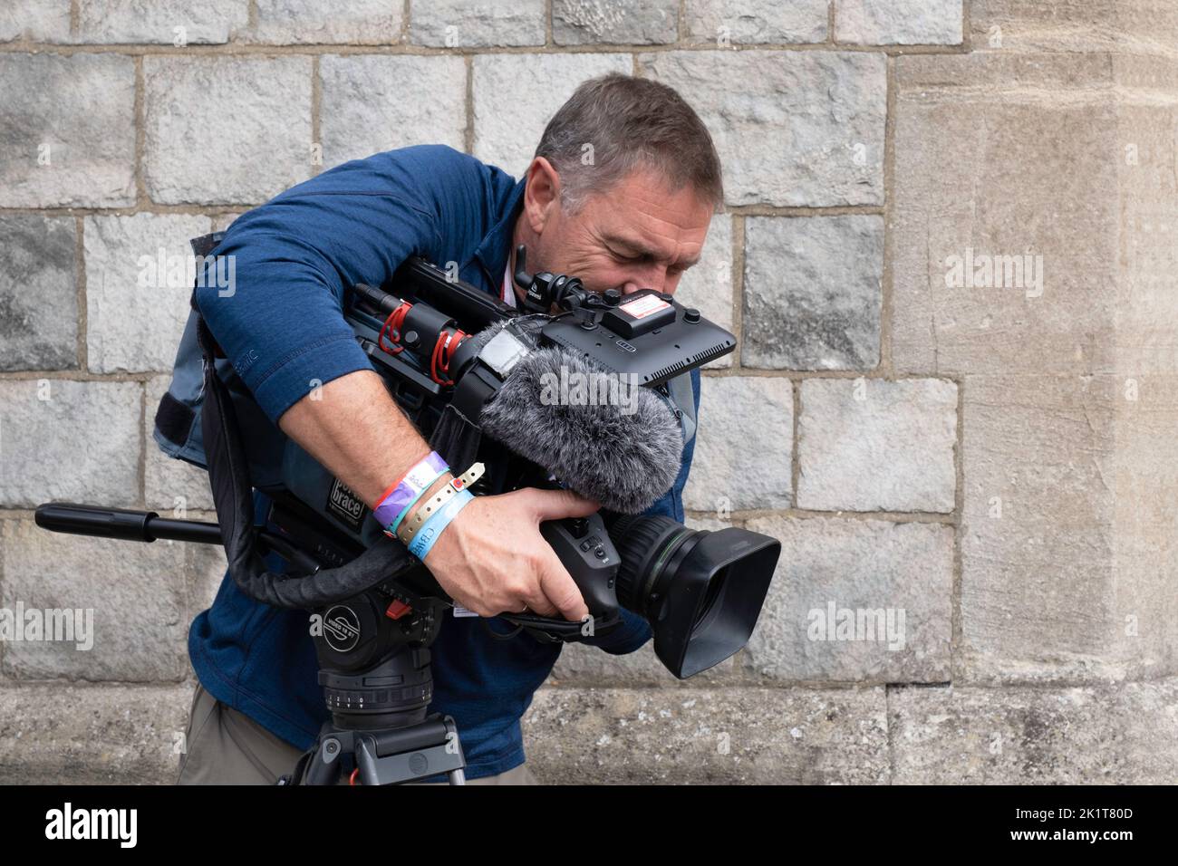 Cameraman with professional equipment at work Stock Photo - Alamy