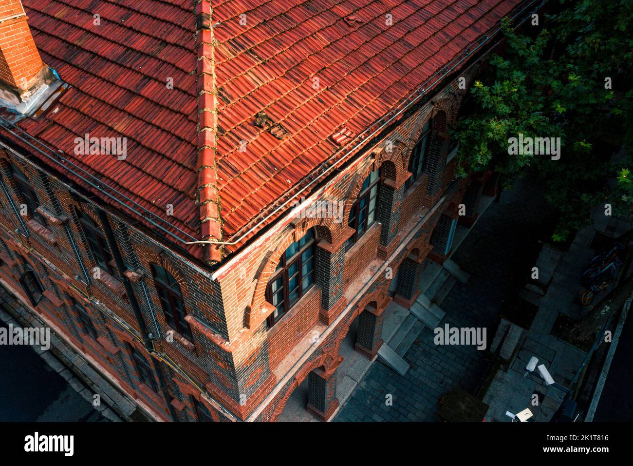 An aerial view of a red brick building at the street Stock Photo - Alamy