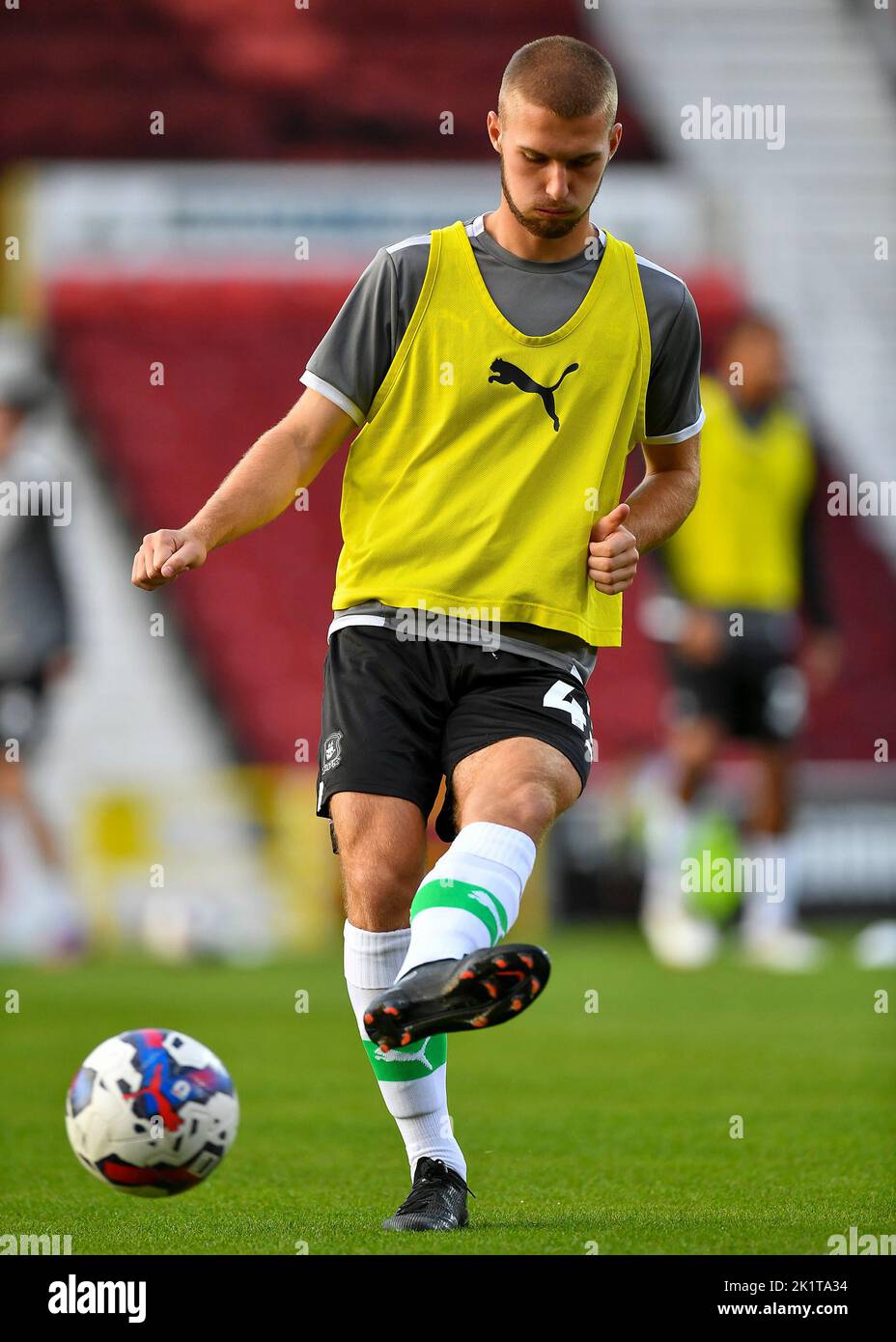 Plymouth Argyle midfielder William Jenkins Davies (44) warming up ...