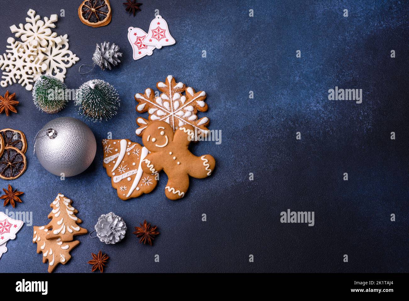 Christmas composition with gingerbread cookies, Christmas toys, pine ...