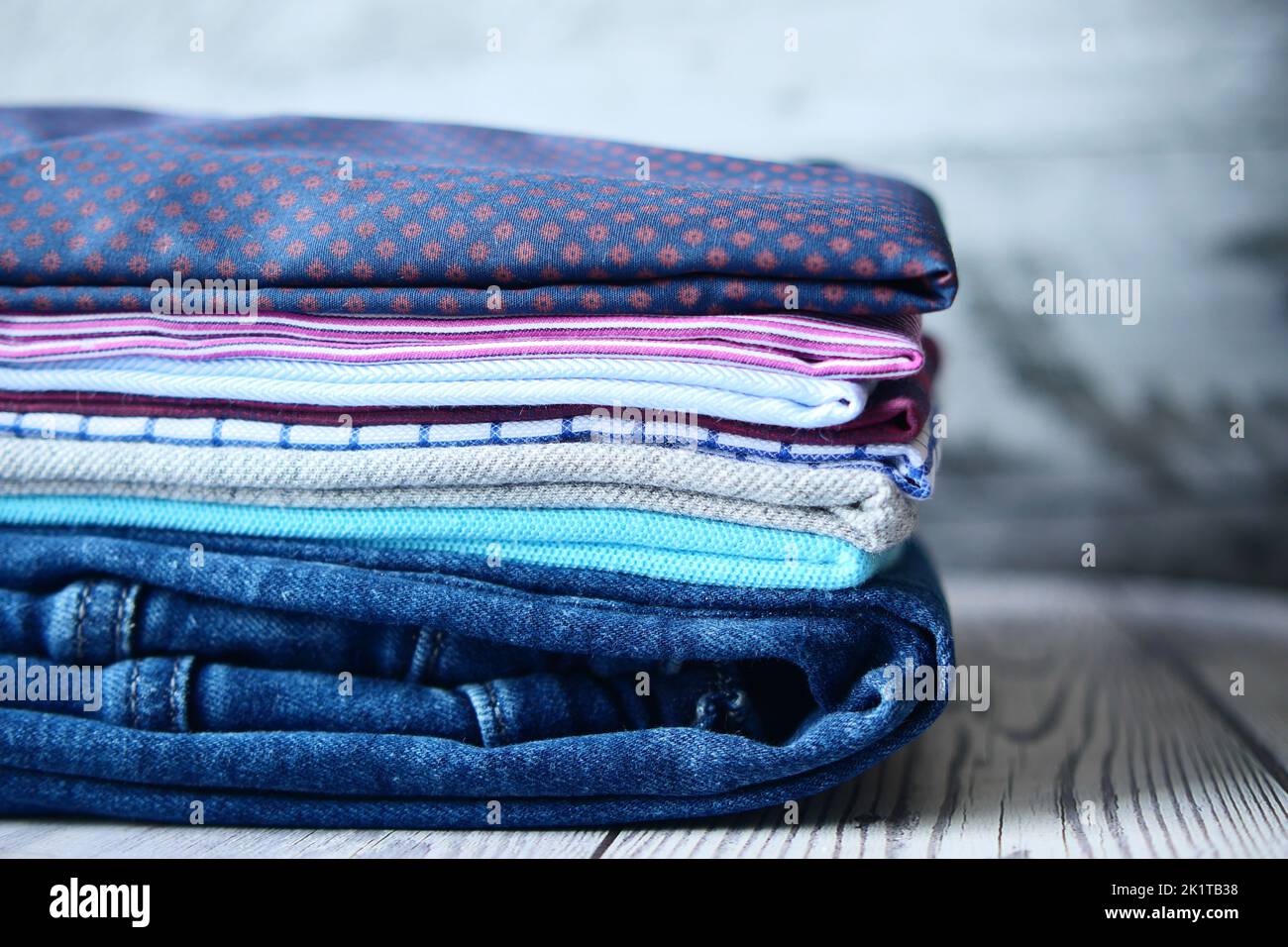 Putting on new shirts hi-res stock photography and images - Alamy