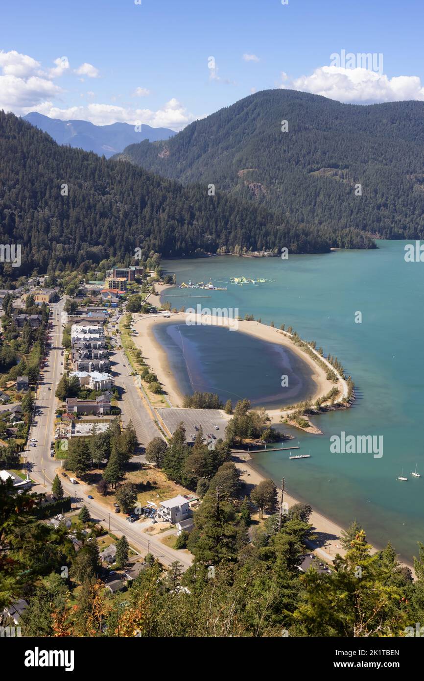 Small touristic town by the lake with Canadian Mountain Landscape Stock ...