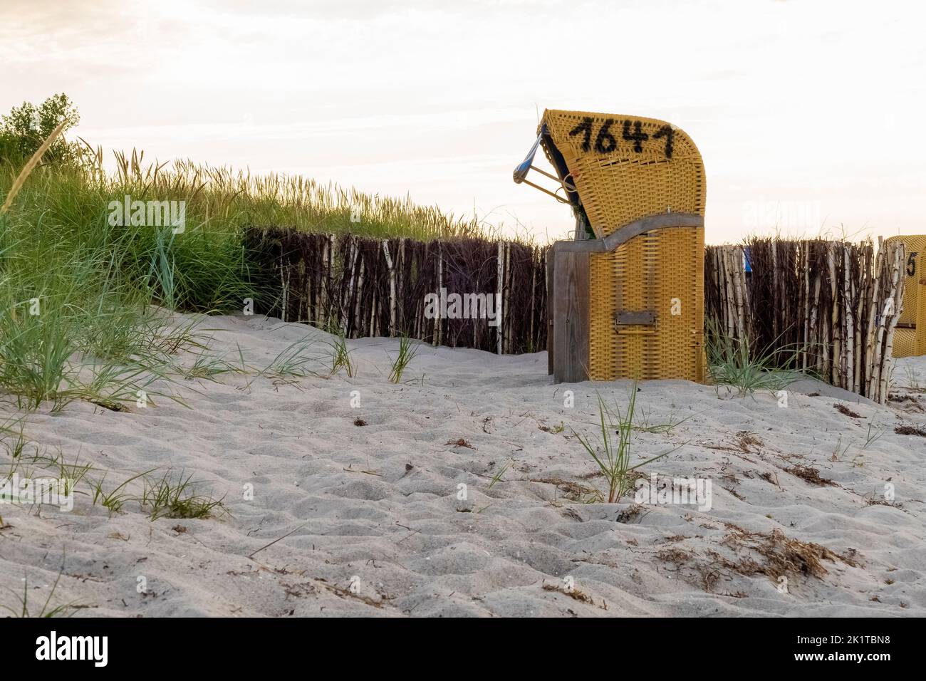A close-up shot of beach box on the sand Stock Photo - Alamy