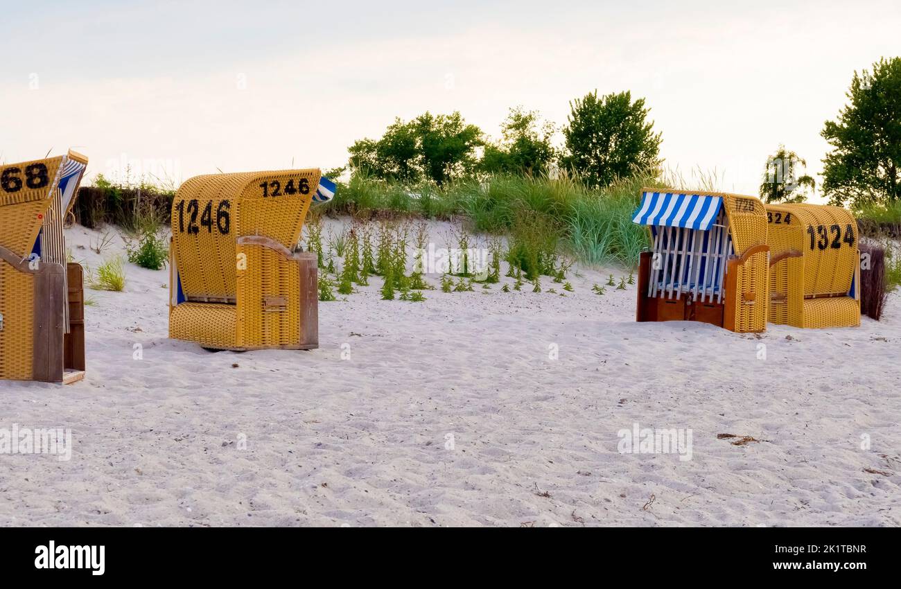 A close-up shot of beach boxes on the sand Stock Photo - Alamy