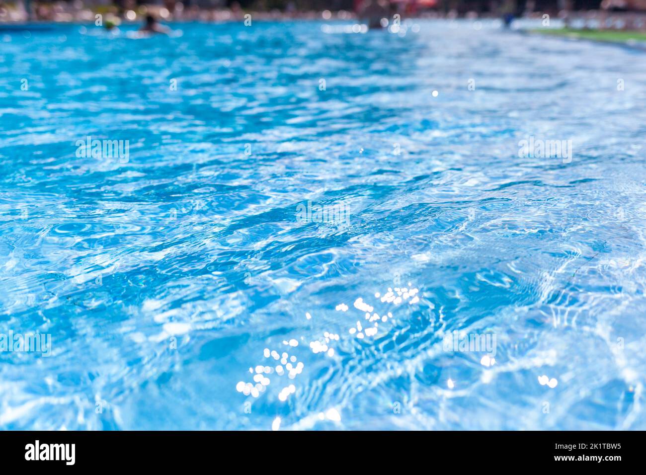 Water background, ripple and flow with waves. Summer blue swiming pool ...