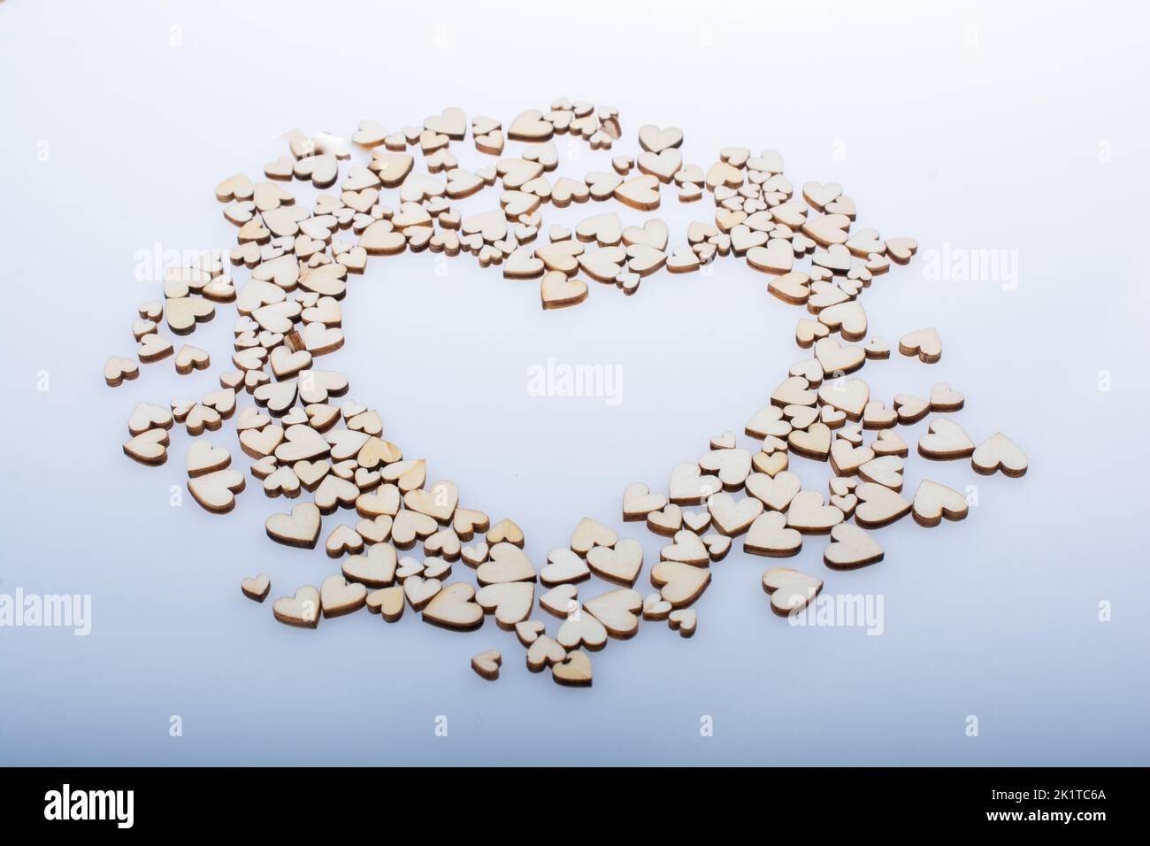 Wooden hearts form heaart shape as love concept Stock Photo - Alamy