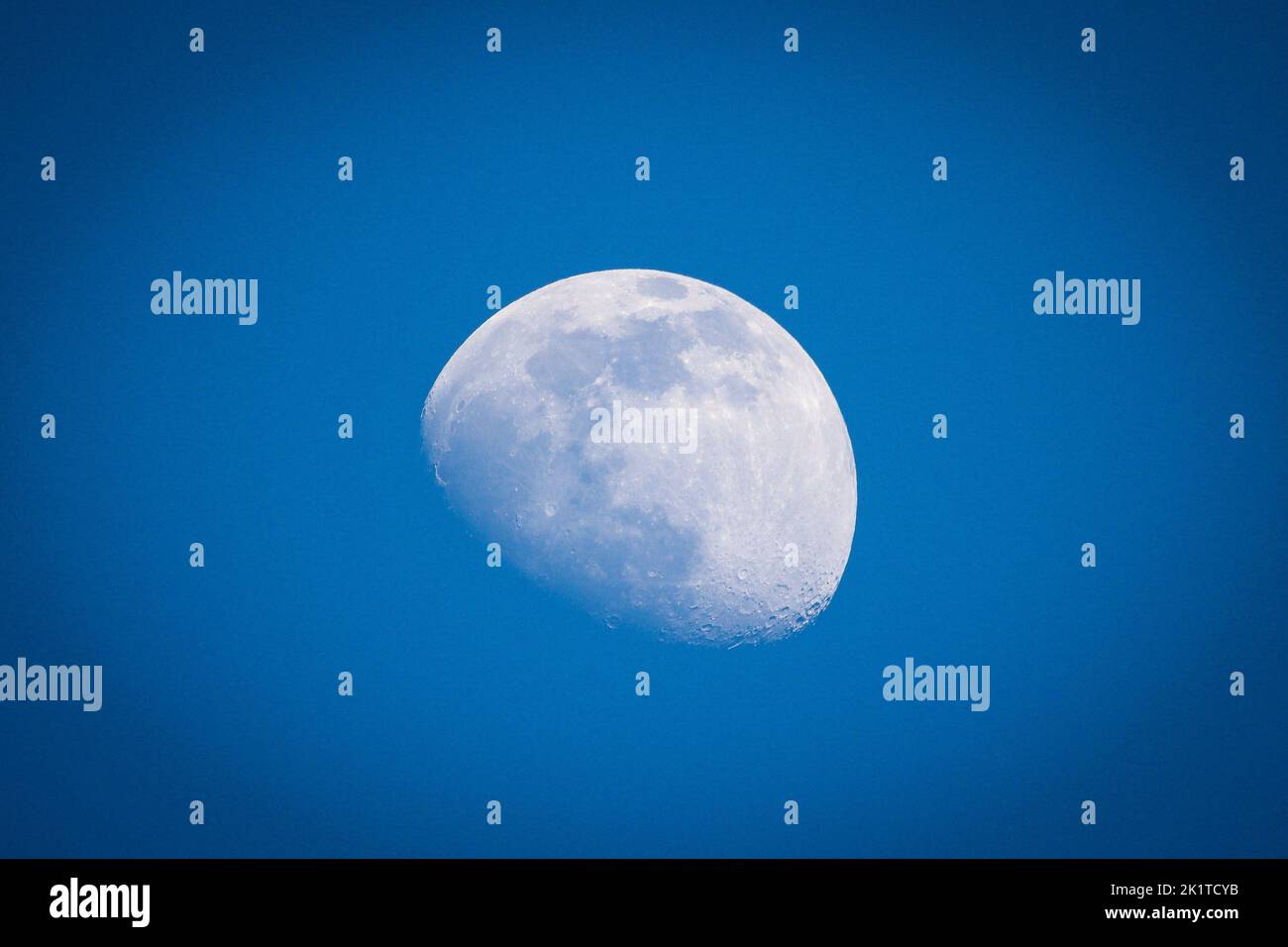 The moon eclipse in the blue sky Stock Photo - Alamy