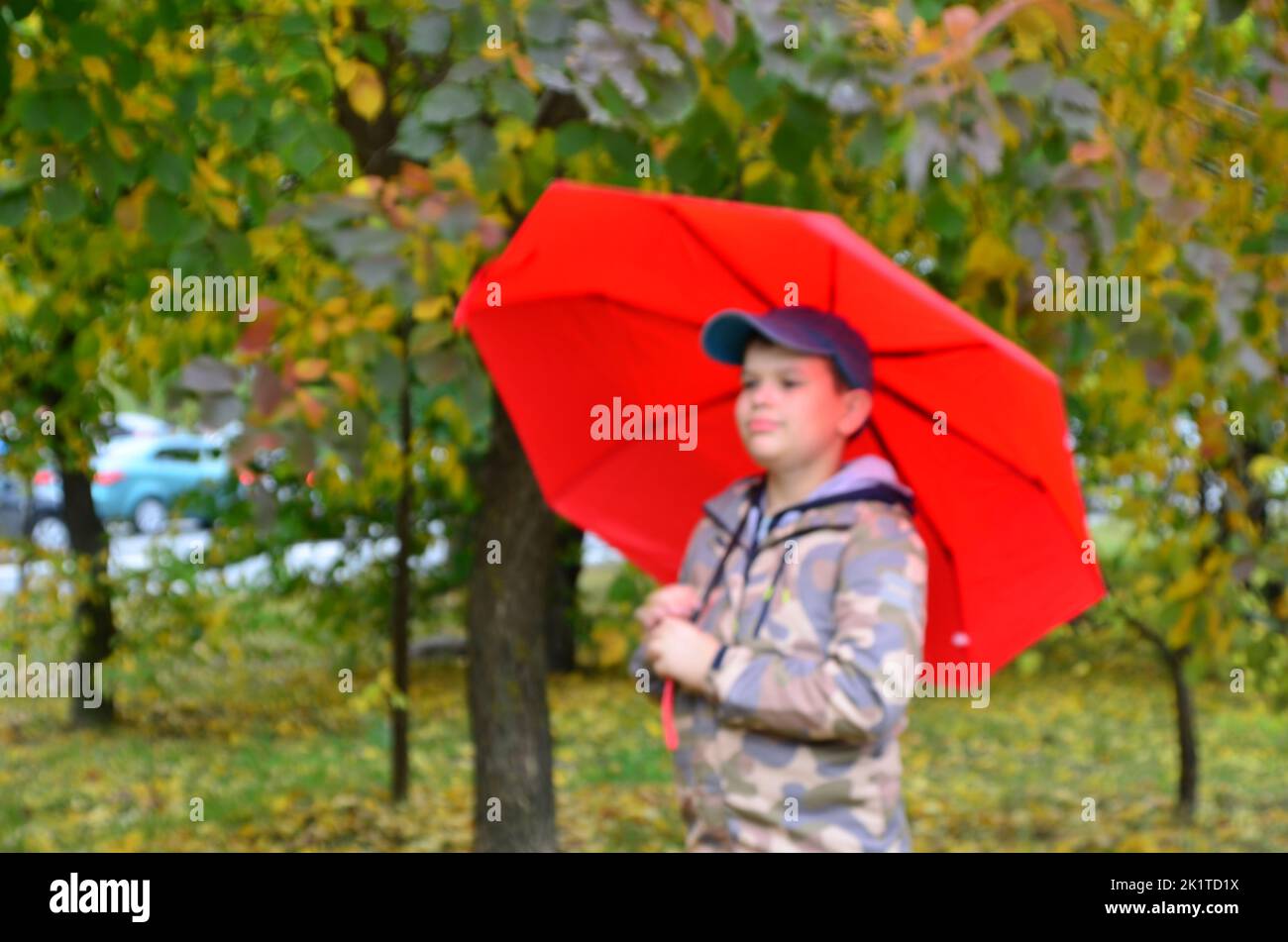 Child wind umbrella hi-res stock photography and images - Alamy