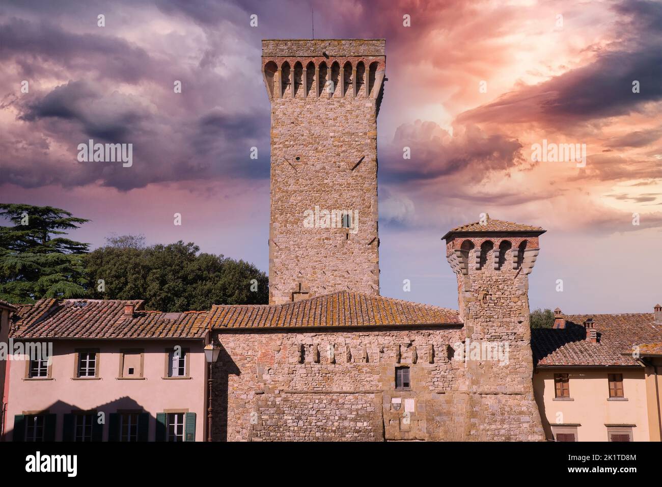 medieval castle in the tuscan town of lucignano at sunset Stock Photo ...