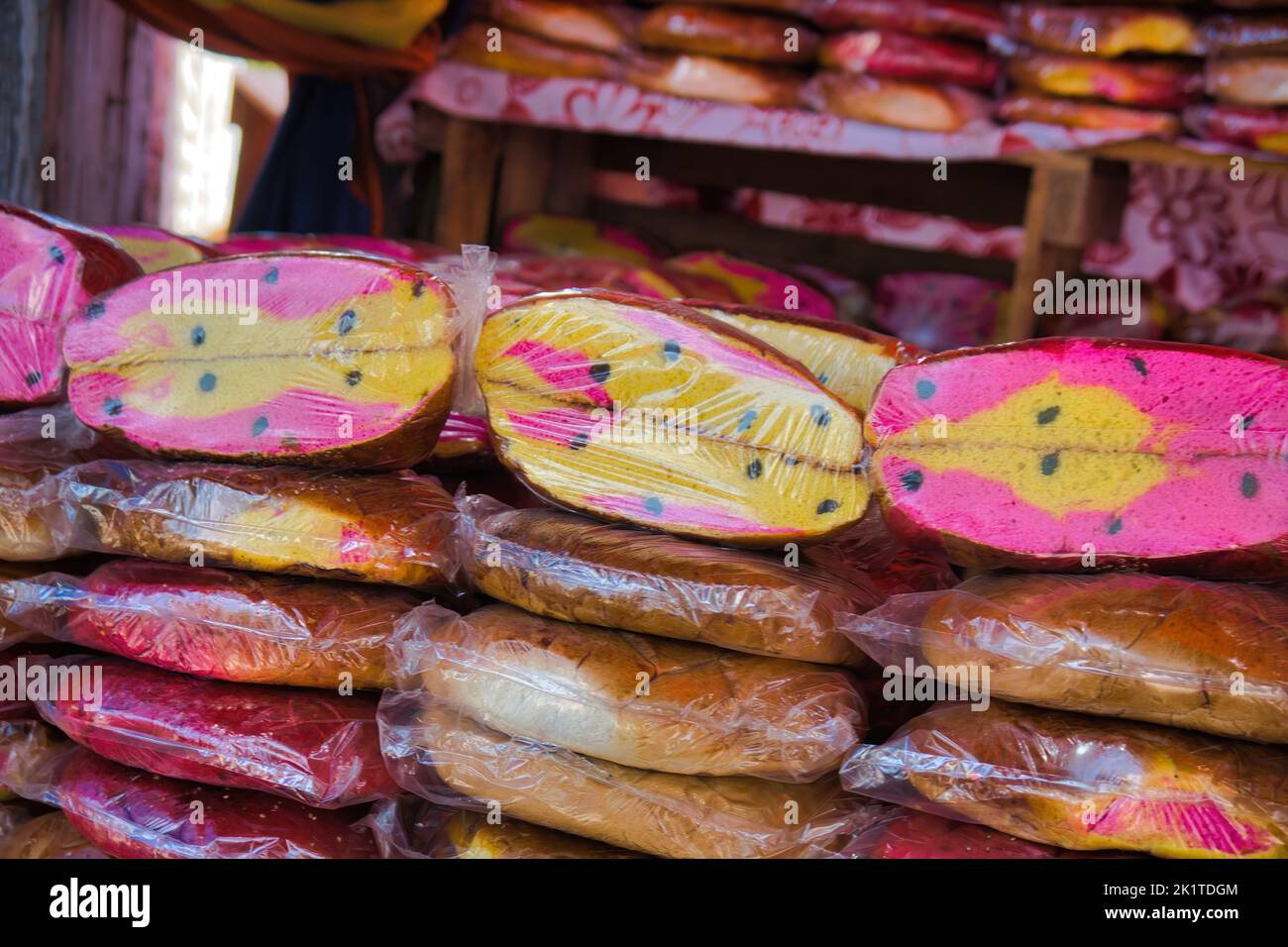 Traditional Mexican pink and yellow party bread Stock Photo - Alamy