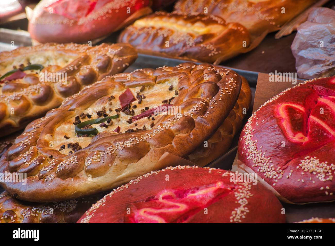 Traditional Mexican pink and yellow party bread Stock Photo - Alamy