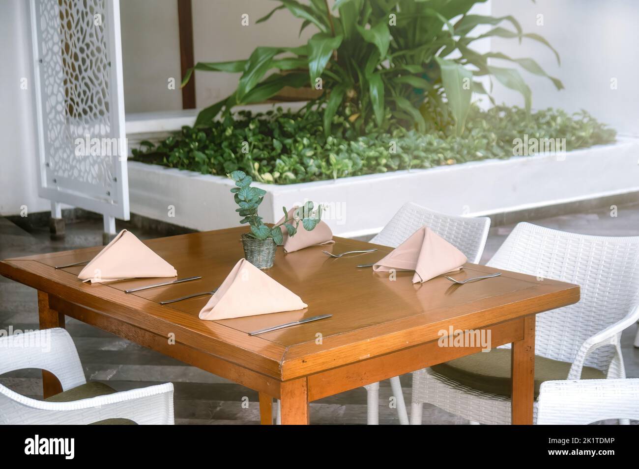 Buffet table with napkins and cutlery Stock Photo - Alamy