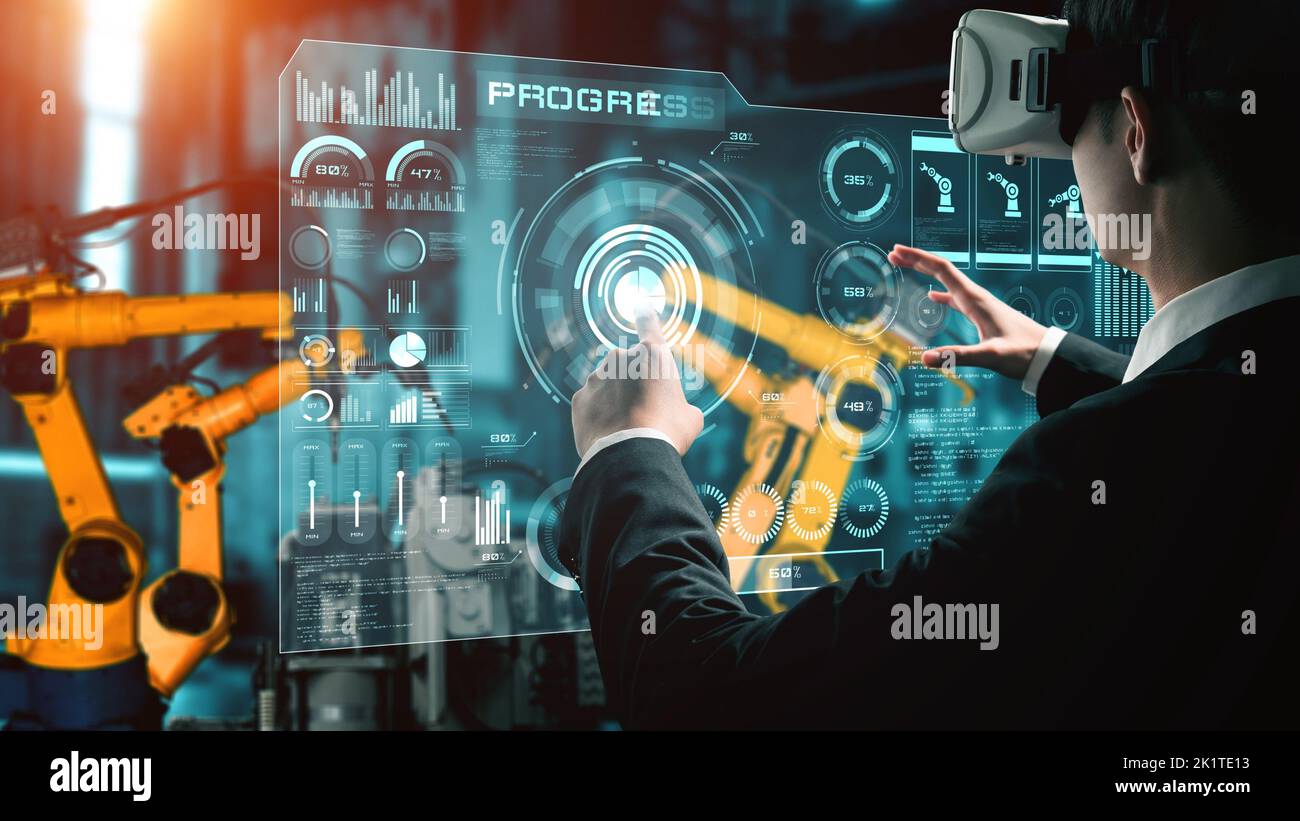 Engineer use cybernated robotic software to control industry robot arm ...