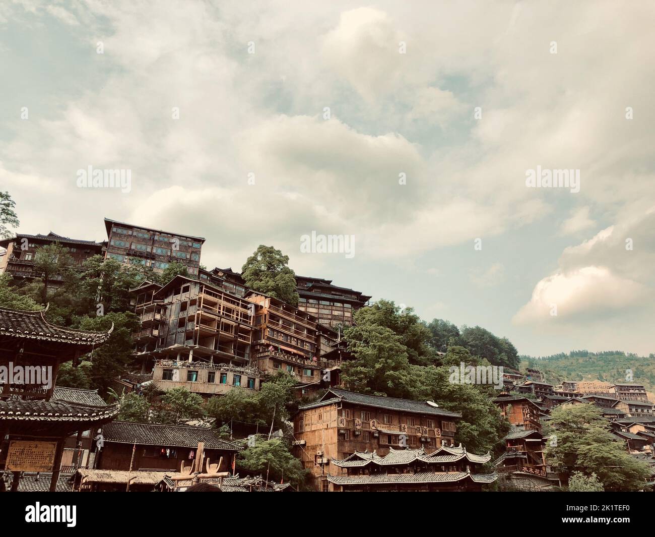 An aerial view of hillside buildings in Xijiang Miao Village, China ...