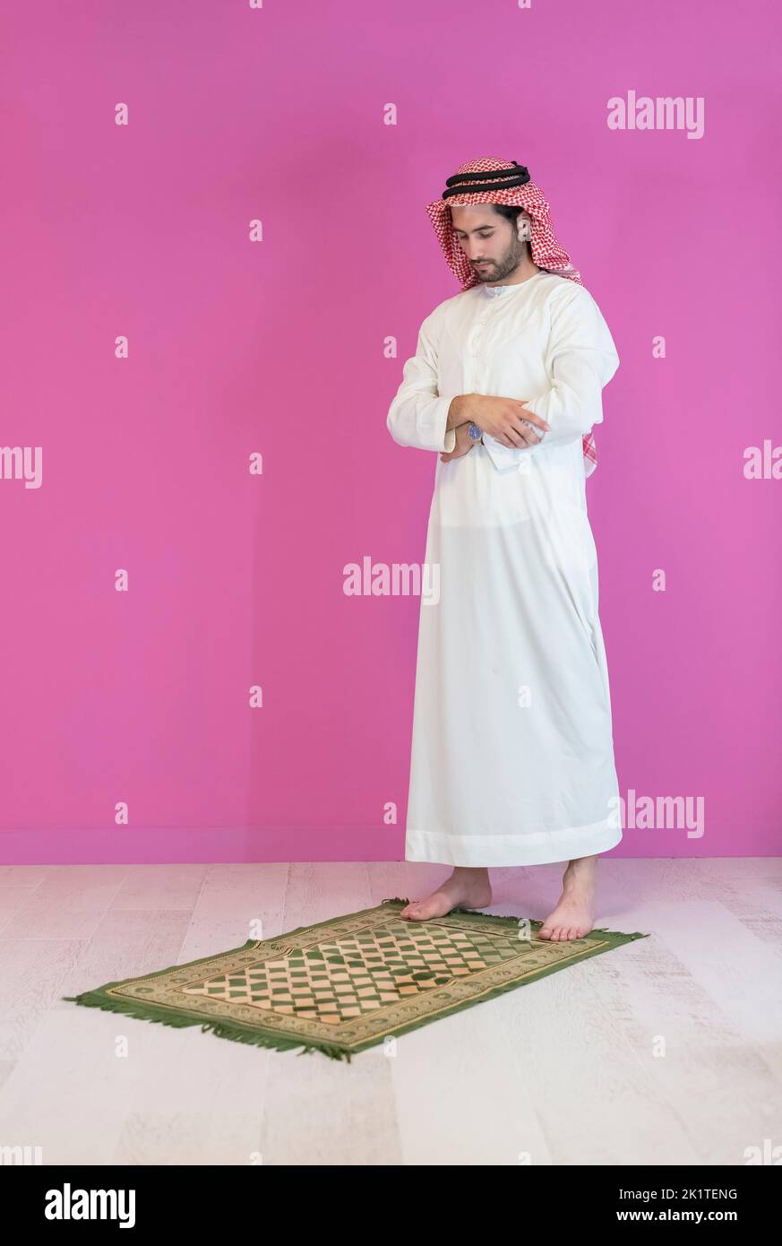 Young muslim man praying salat during Ramadan Stock Photo - Alamy