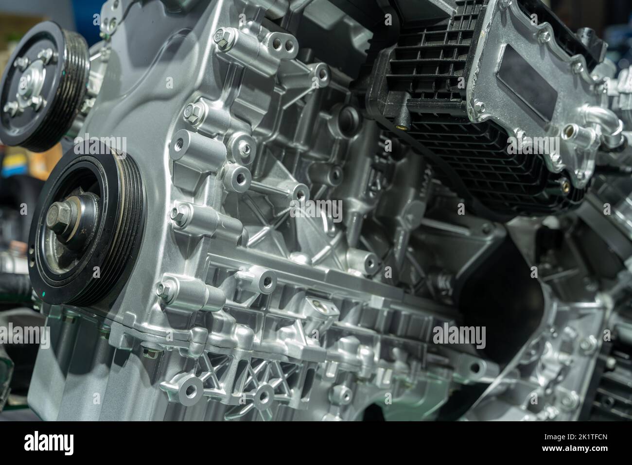 A closeup shot of a modern automobile vehicle engine and spare parts ...