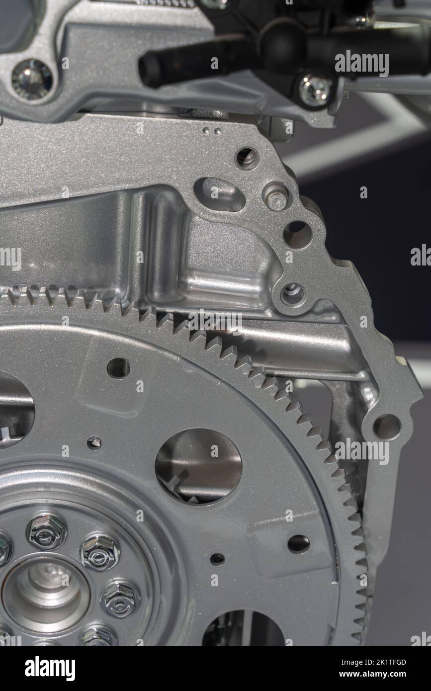 A vertical shot of a modern automobile vehicle engine and spare parts ...