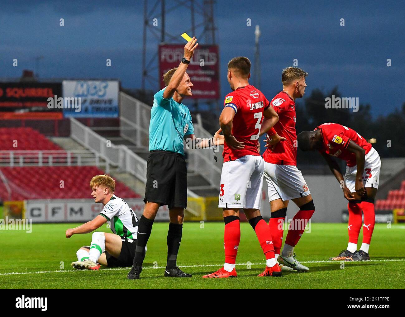 Swindon Town defender Ellis Iandolo (3) receives a yellow card during ...