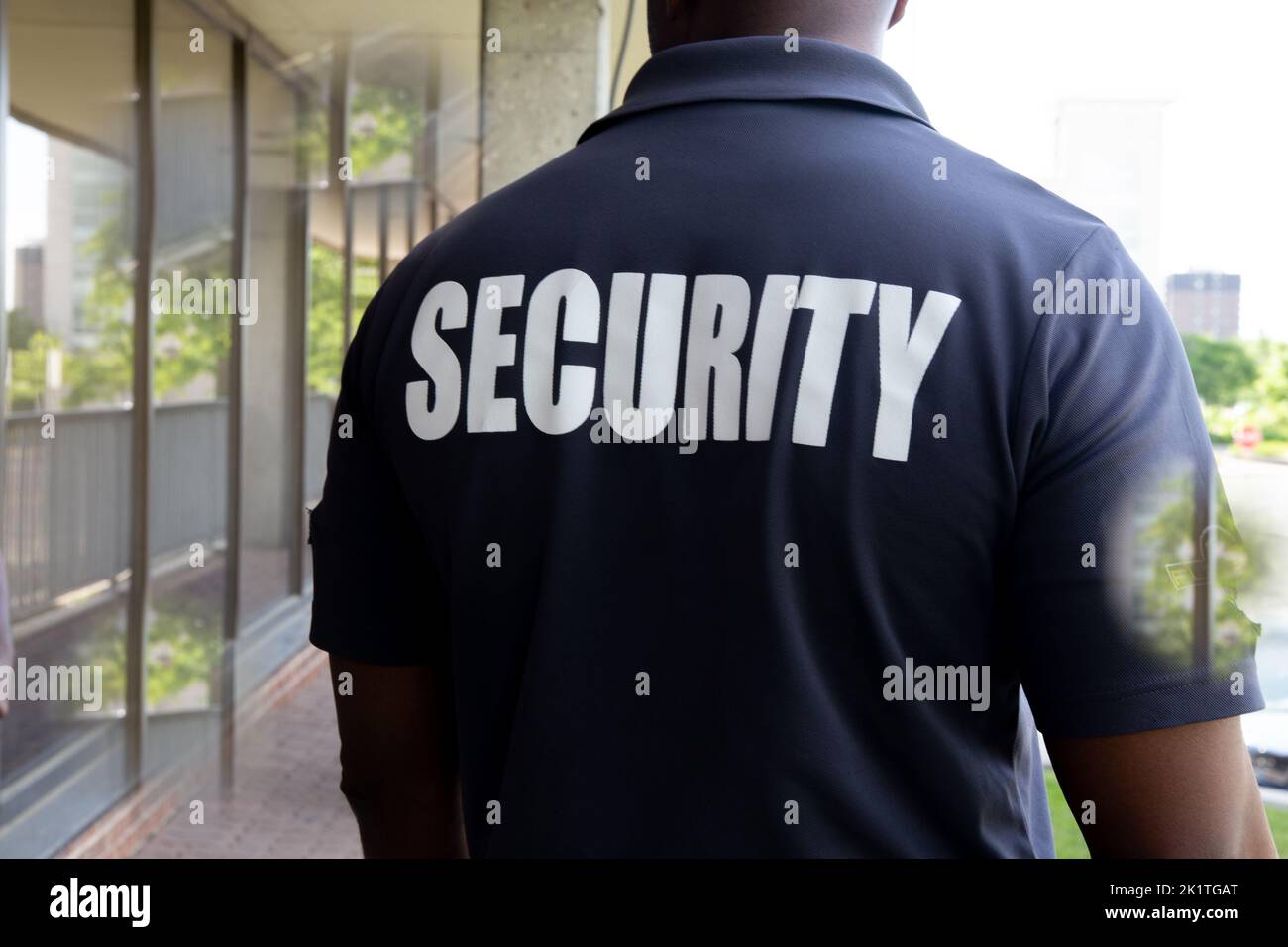 A security guard is patrolling an office building Stock Photo - Alamy