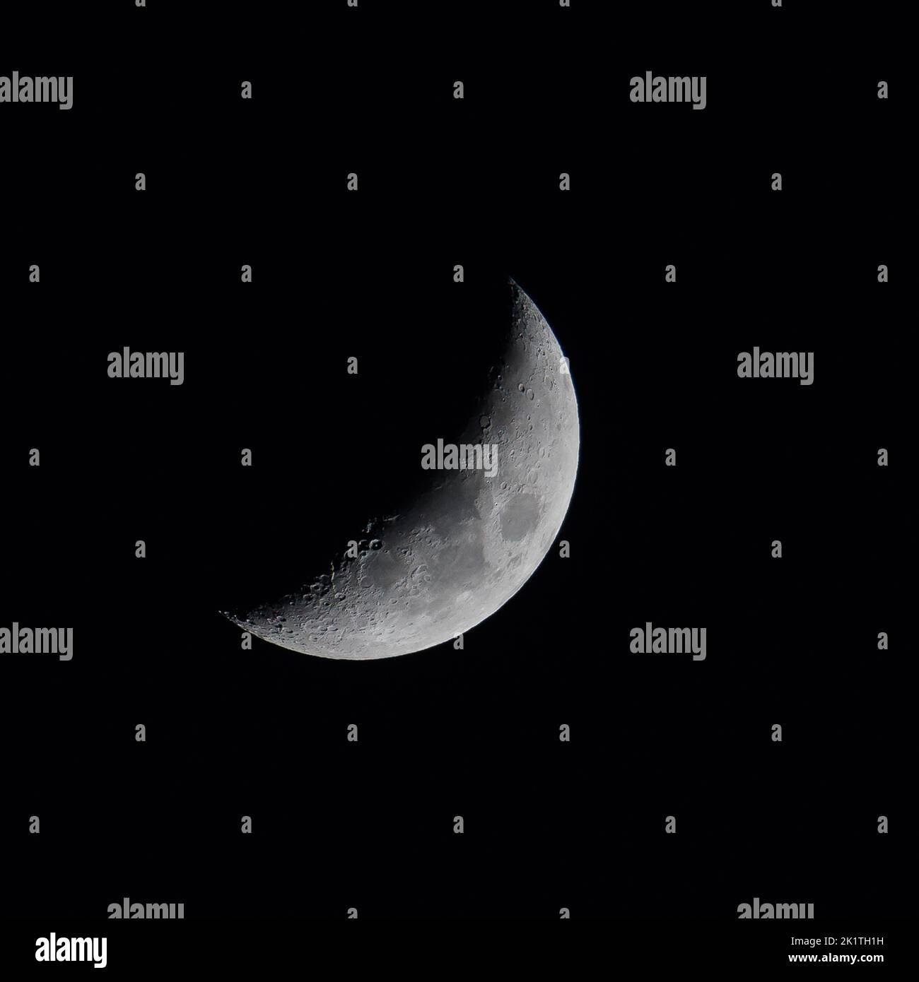 A bright moon in the sky during night time Stock Photo - Alamy