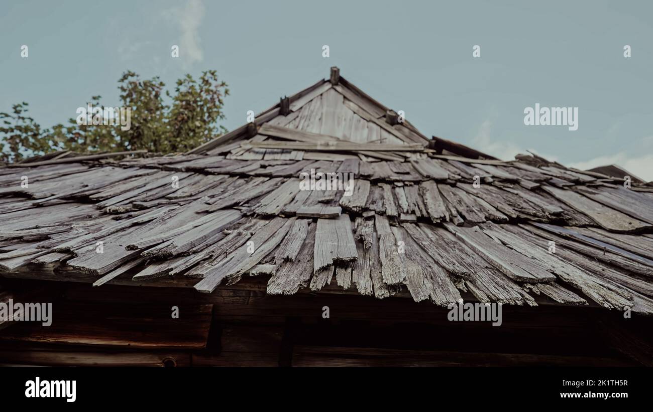 Old wooden roof of hutsul house on meadow of Carpathian Mountains ...