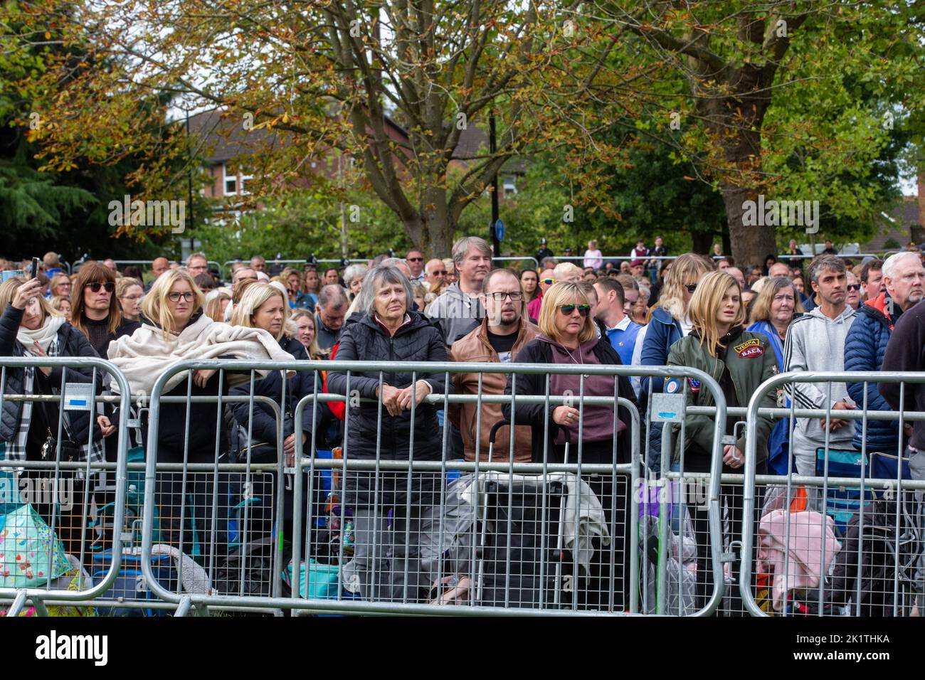 Windsor, UK. 19th September, 2022. Mourners watch the funeral of Queen ...