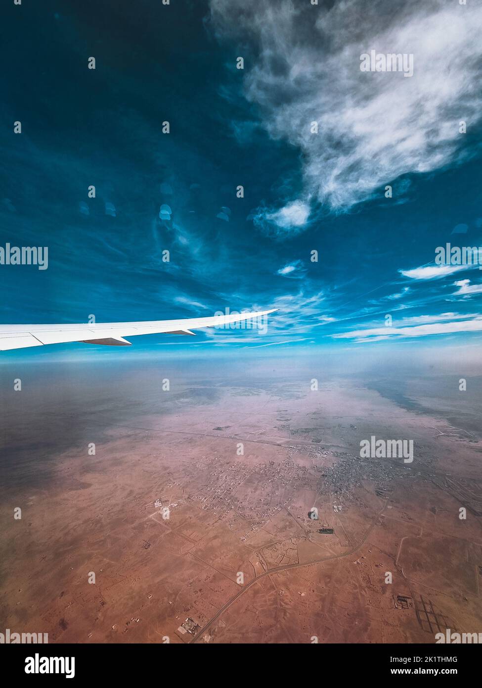 The outside view taken inside the airplane window Stock Photo - Alamy