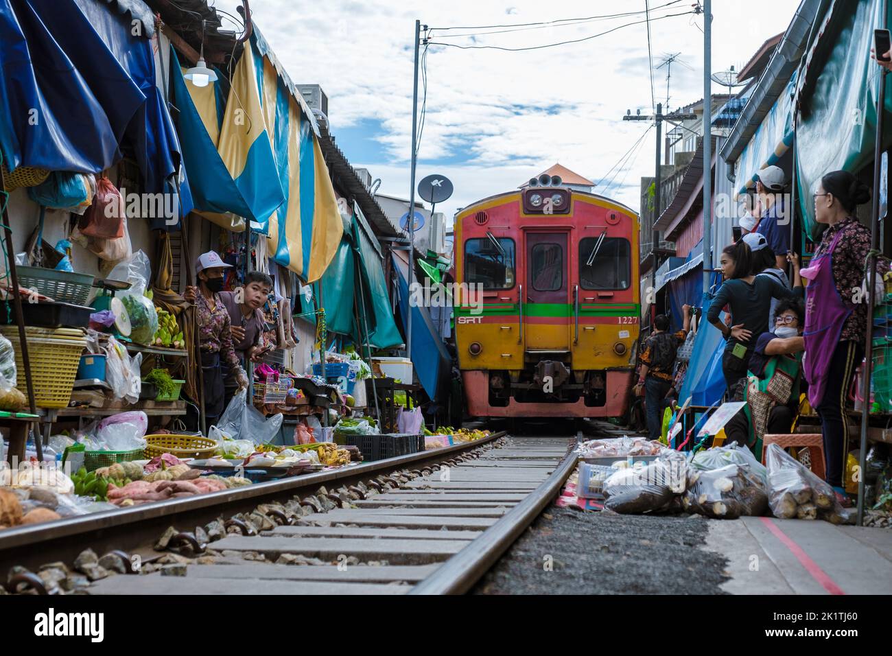 Maeklong Railway Market Thailand, . Train on Tracks Moving Slow ...