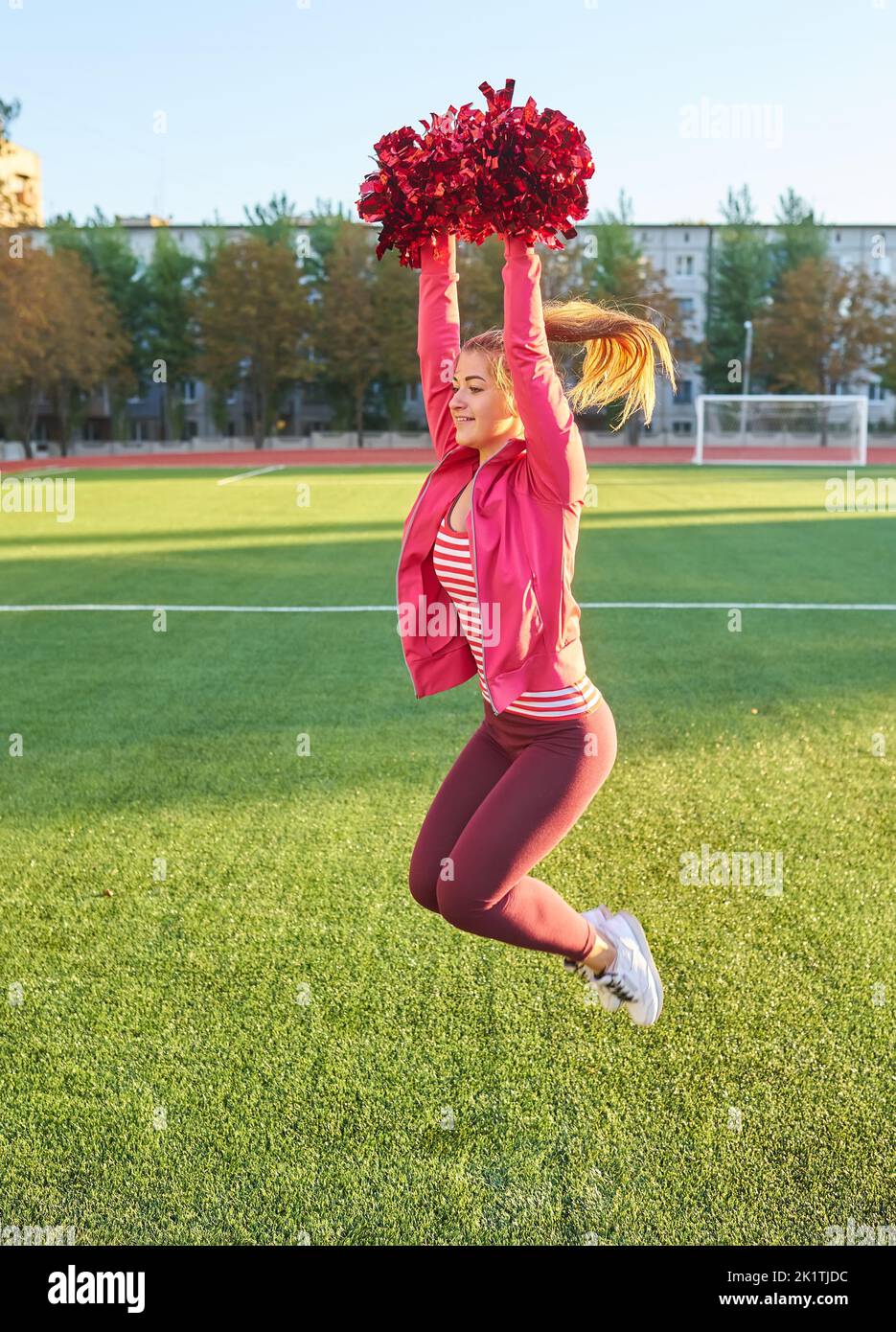 Cheerleaders in action at the stadium. Early morning workout Stock ...