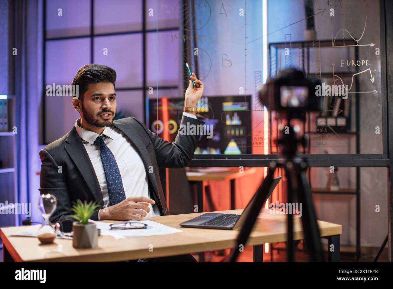 Concept of distant work at night. Attractive confident arab skilled ...