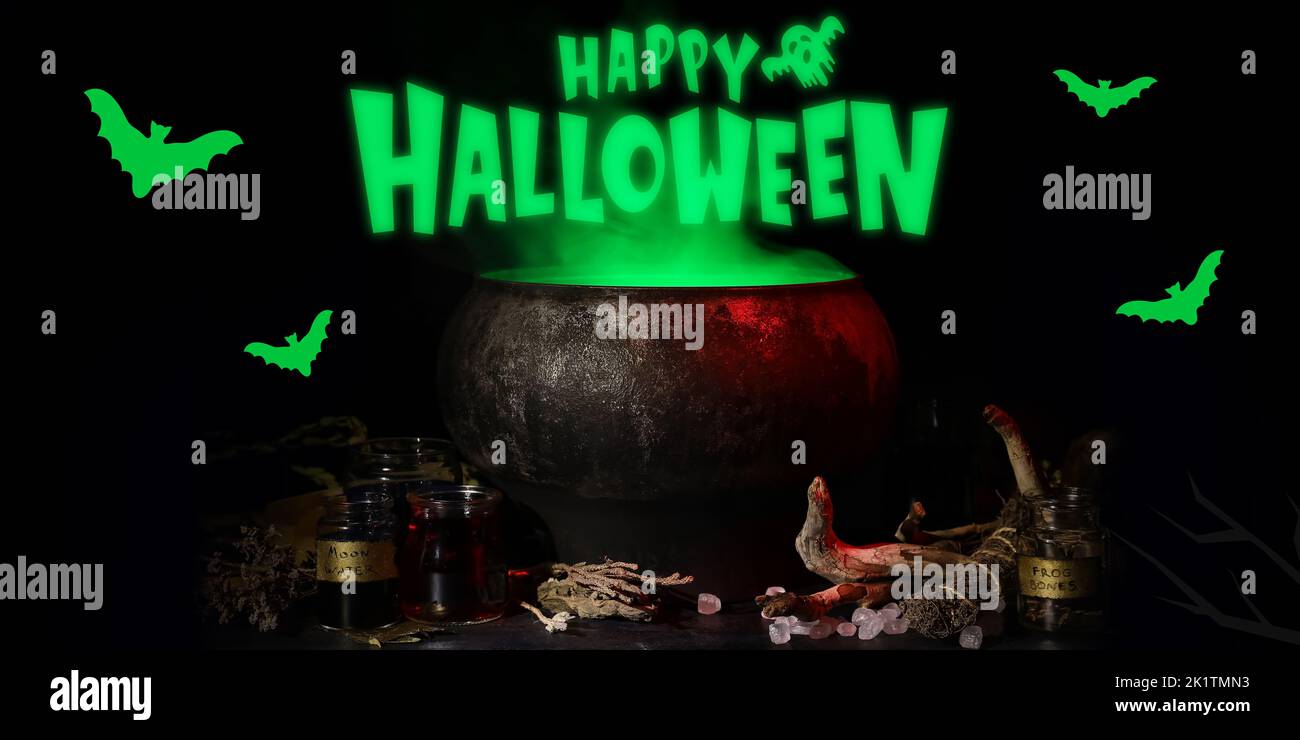 Witch's cauldron with potion and magic attributes for ritual on dark ...