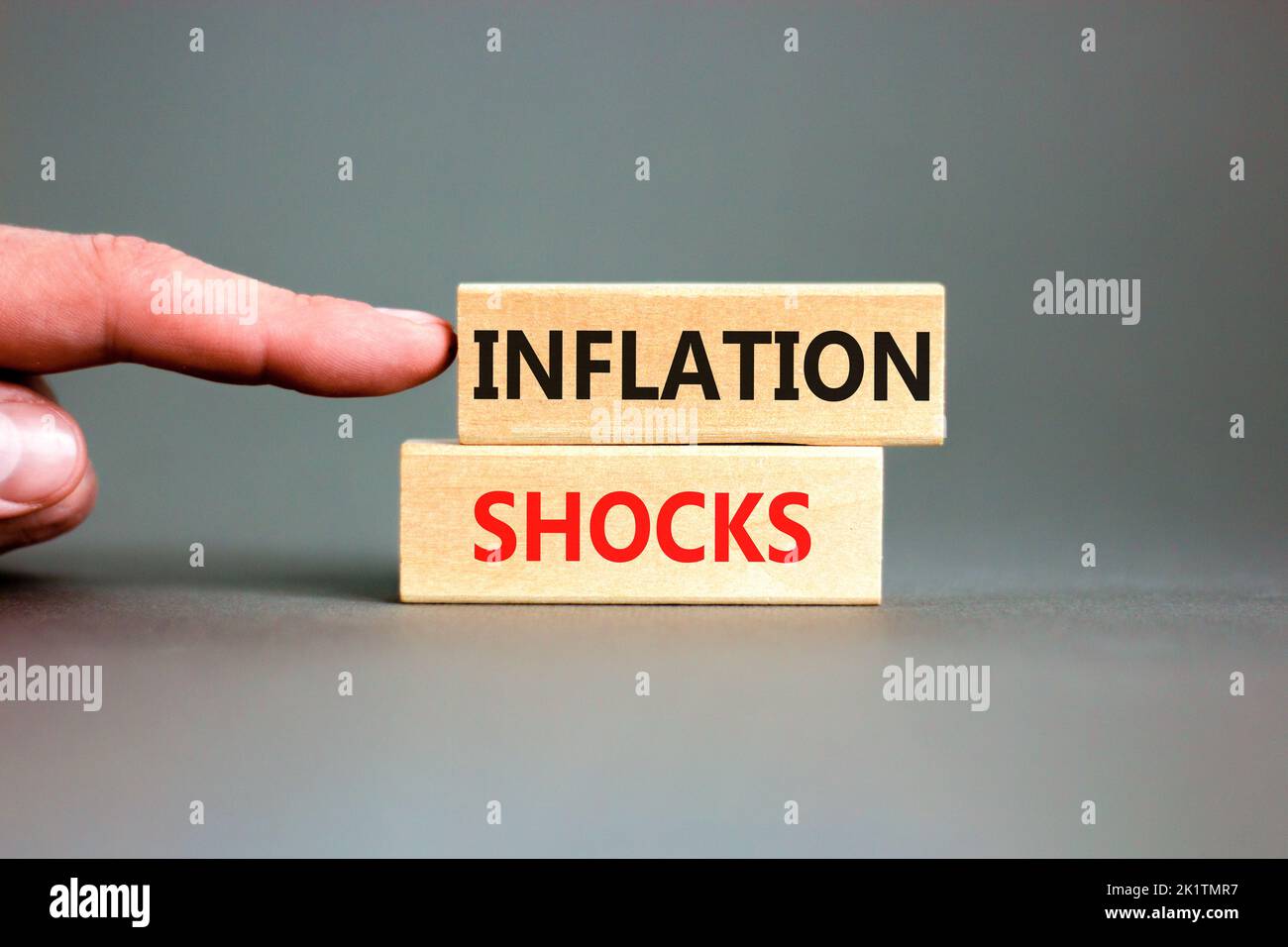 Inflation shocks symbol. Concept words Inflation shocks on wooden ...
