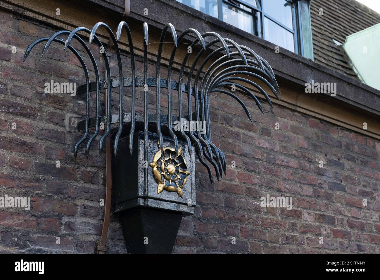 Metal fences with sharp hooks for protection and to prevent climbing ...