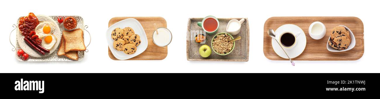 Collection of trays with tasty breakfasts on white background, top view ...