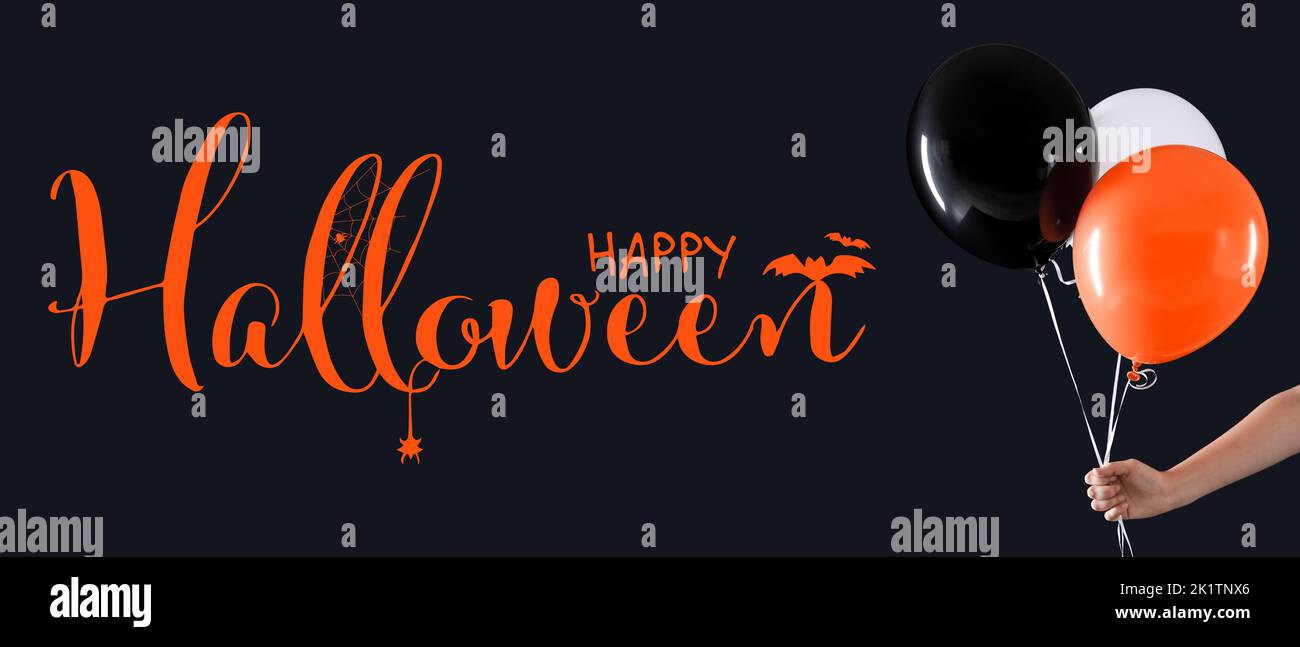 Banner for Halloween with balloons on black background Stock Photo - Alamy