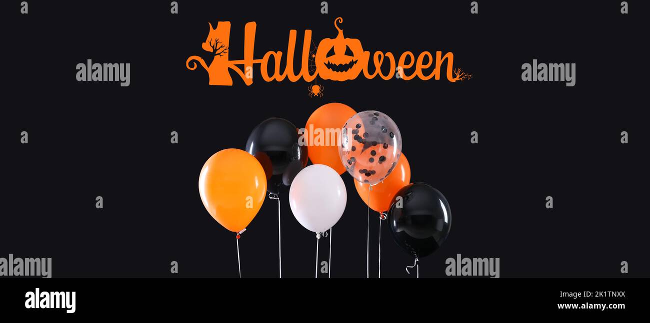 Banner for Halloween with balloons on black background Stock Photo - Alamy