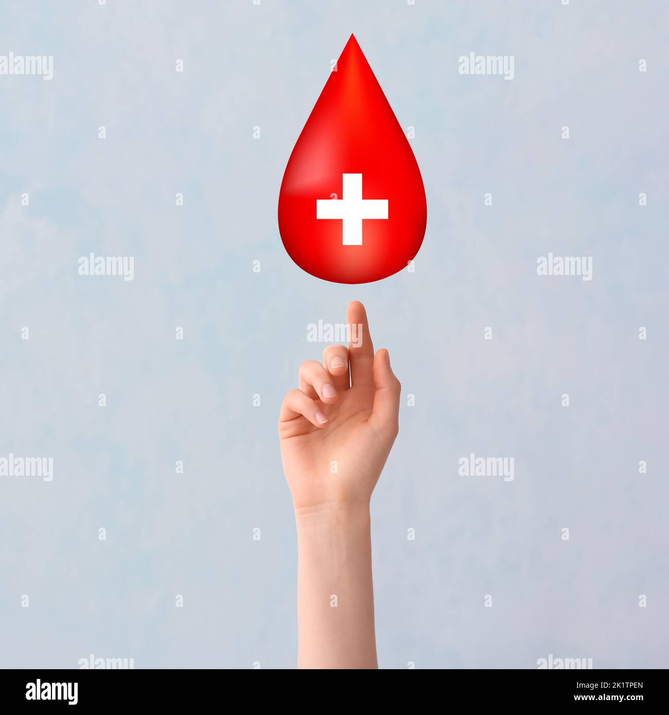 Female hand and drop of blood on grey background Stock Photo - Alamy