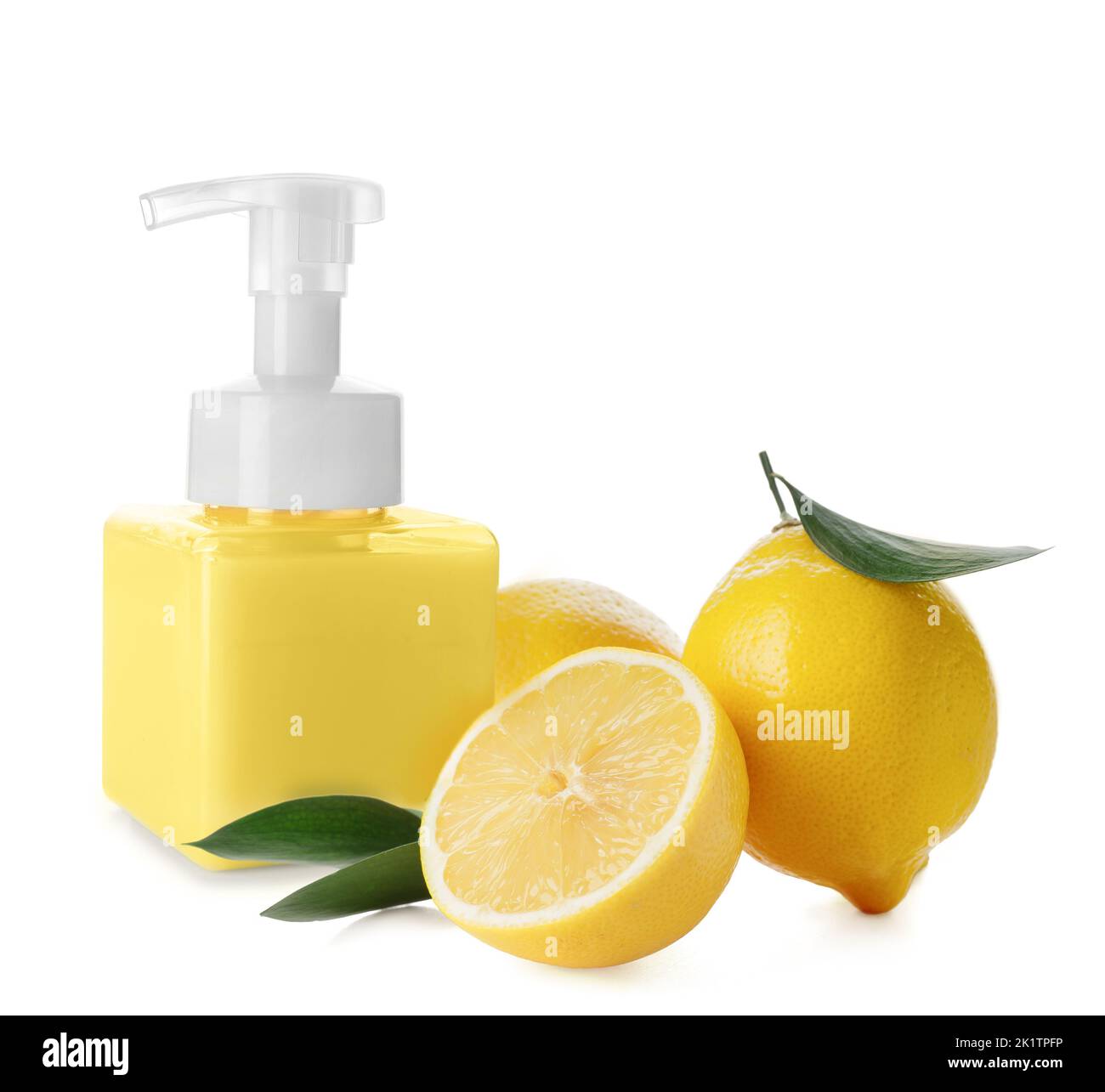 Bottle of natural cosmetics and lemons on white background Stock Photo ...