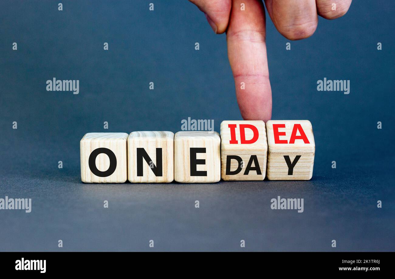 One day and idea symbol. Concept words One day and One idea on wooden ...