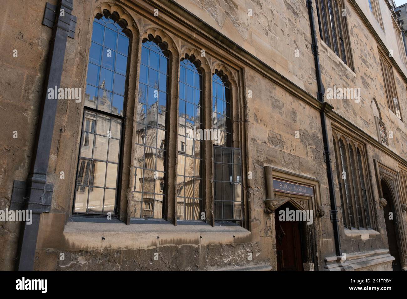 Facade of the Schola Musicae with building of the Divinity School ...