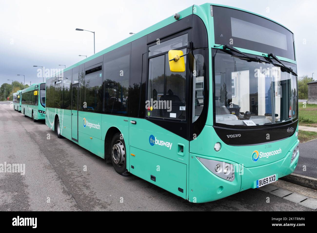 Side view of three parked 'Stagecoach' buses with horizontal guide ...