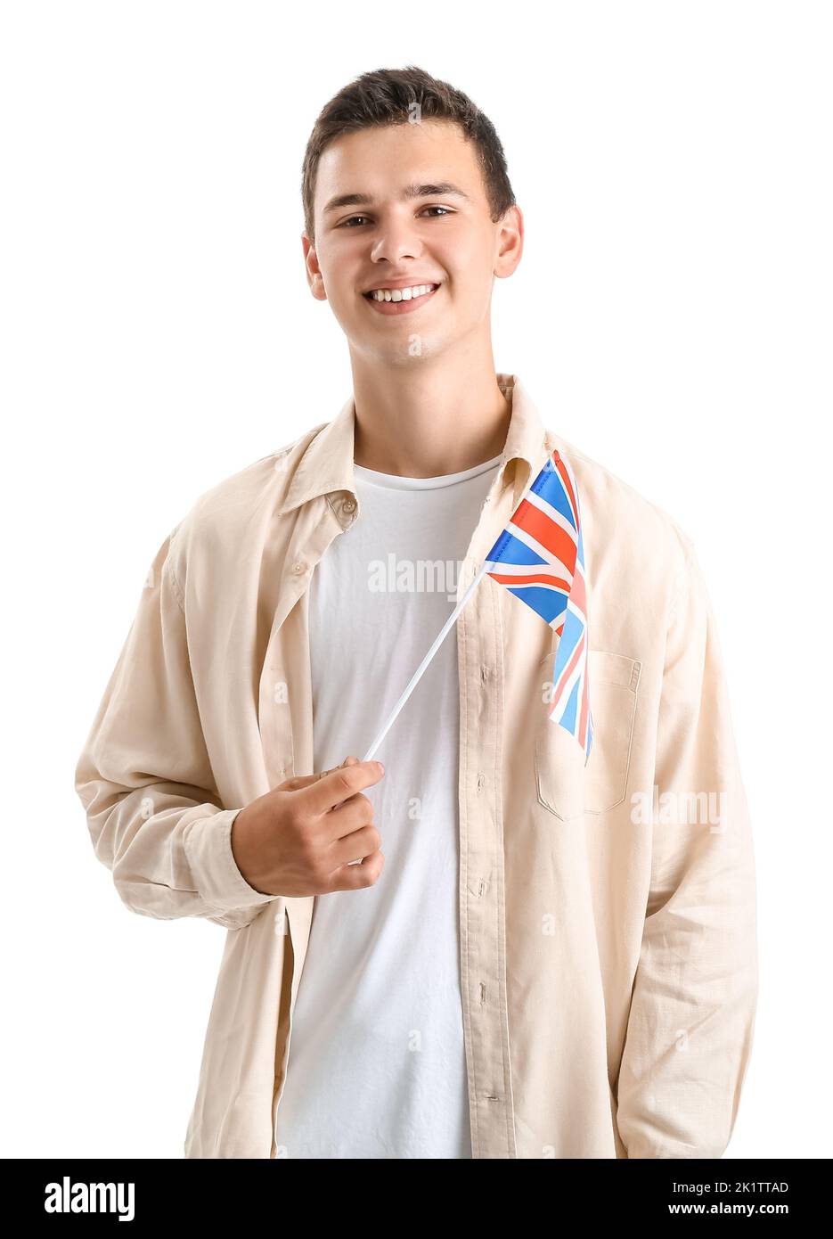 Teenage boy with UK flag on white background Stock Photo - Alamy