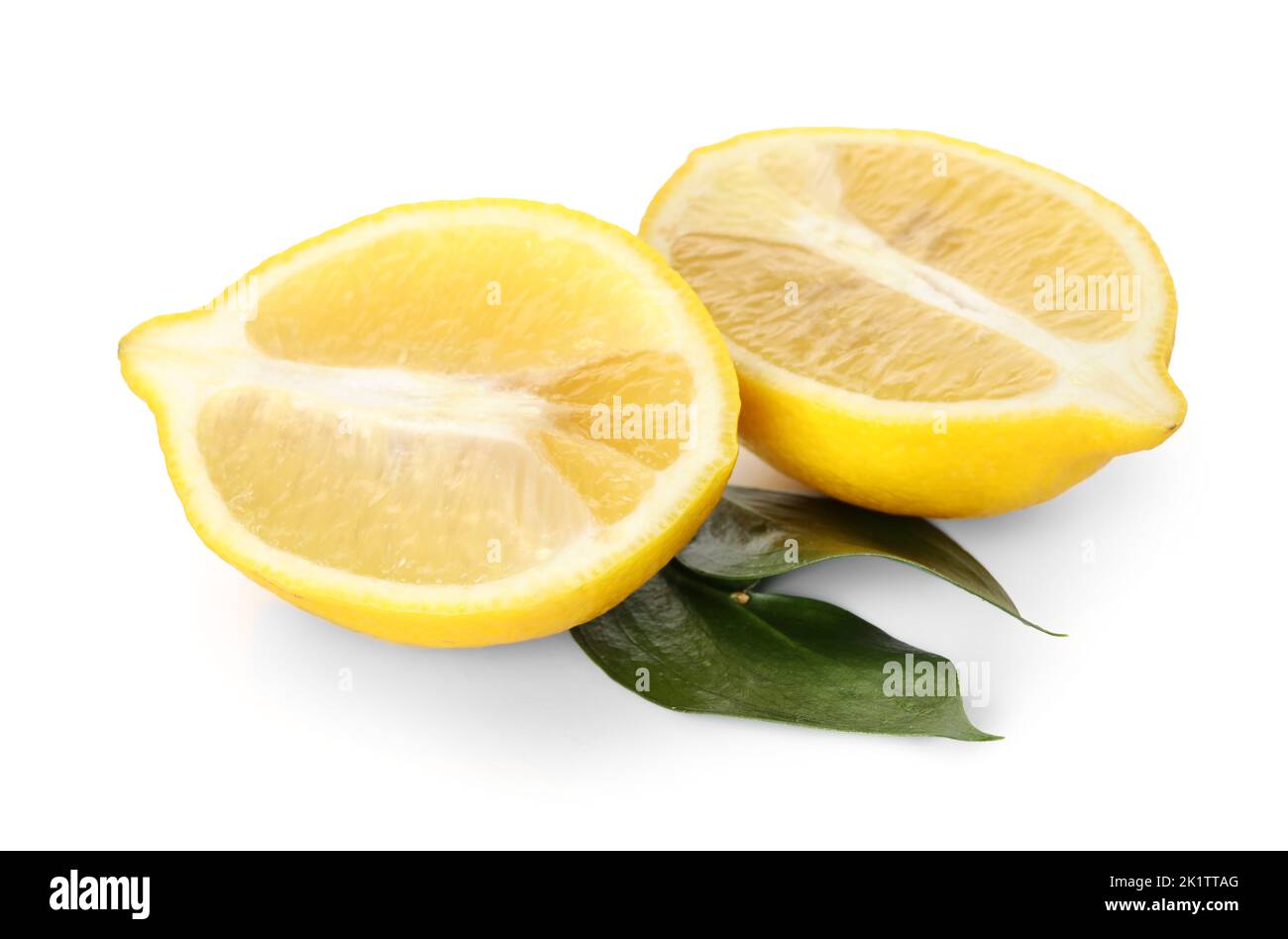 Halves of fresh lemon on white background Stock Photo - Alamy