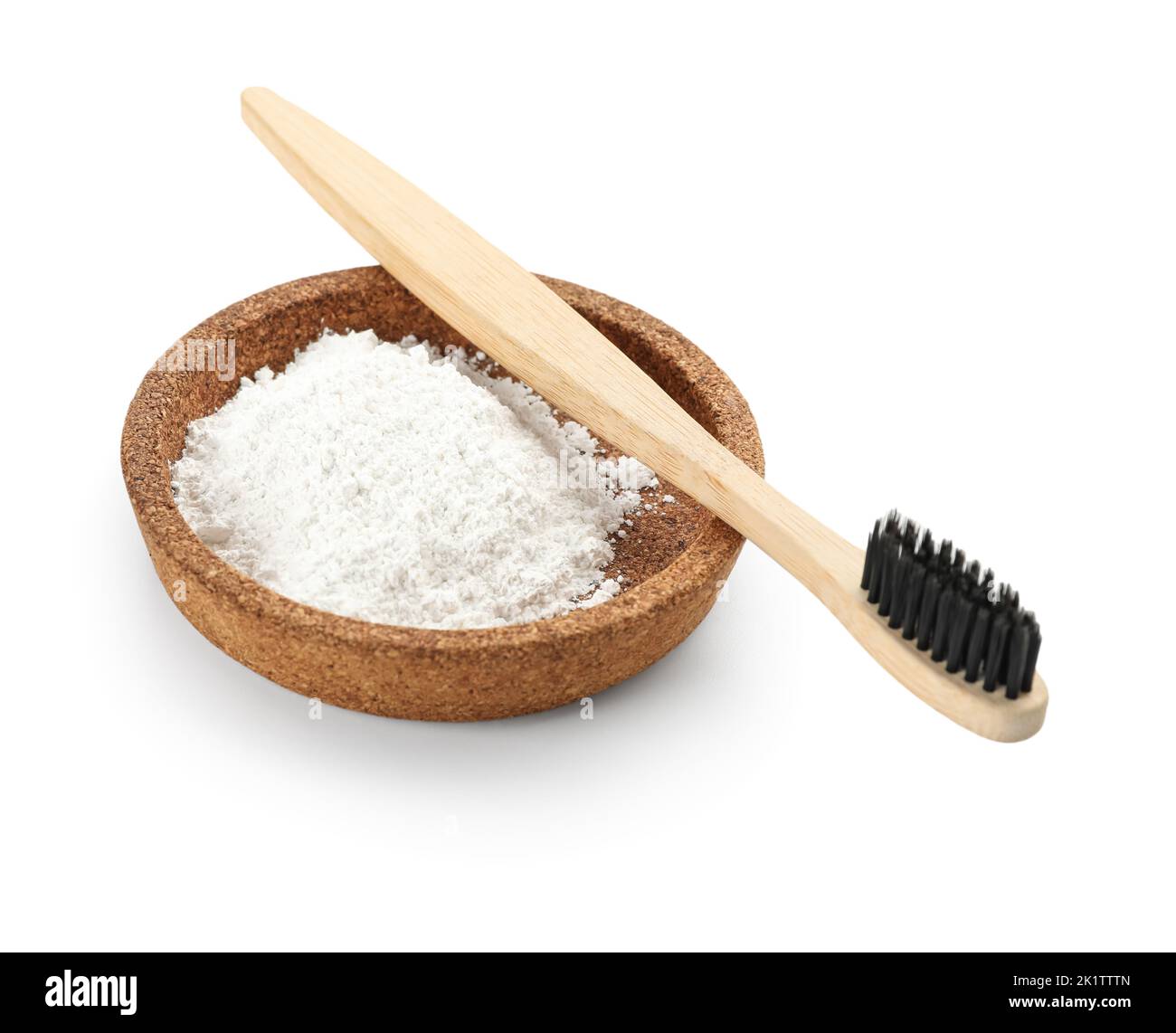Bowl of tooth powder and brush on white background Stock Photo - Alamy