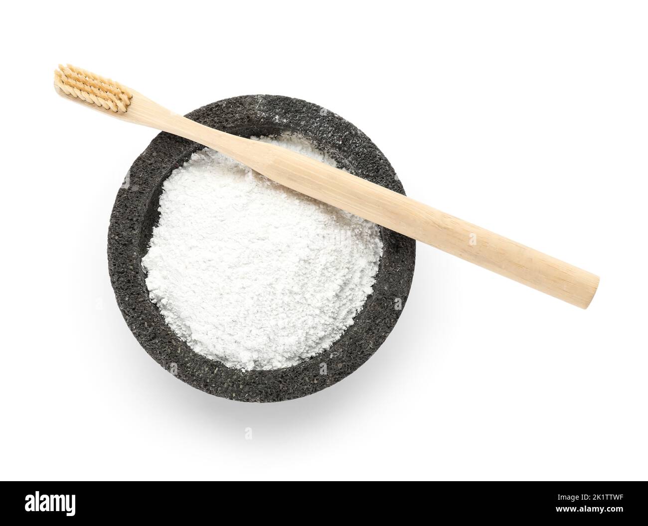 Bowl of tooth powder with bamboo brush on white background Stock Photo ...