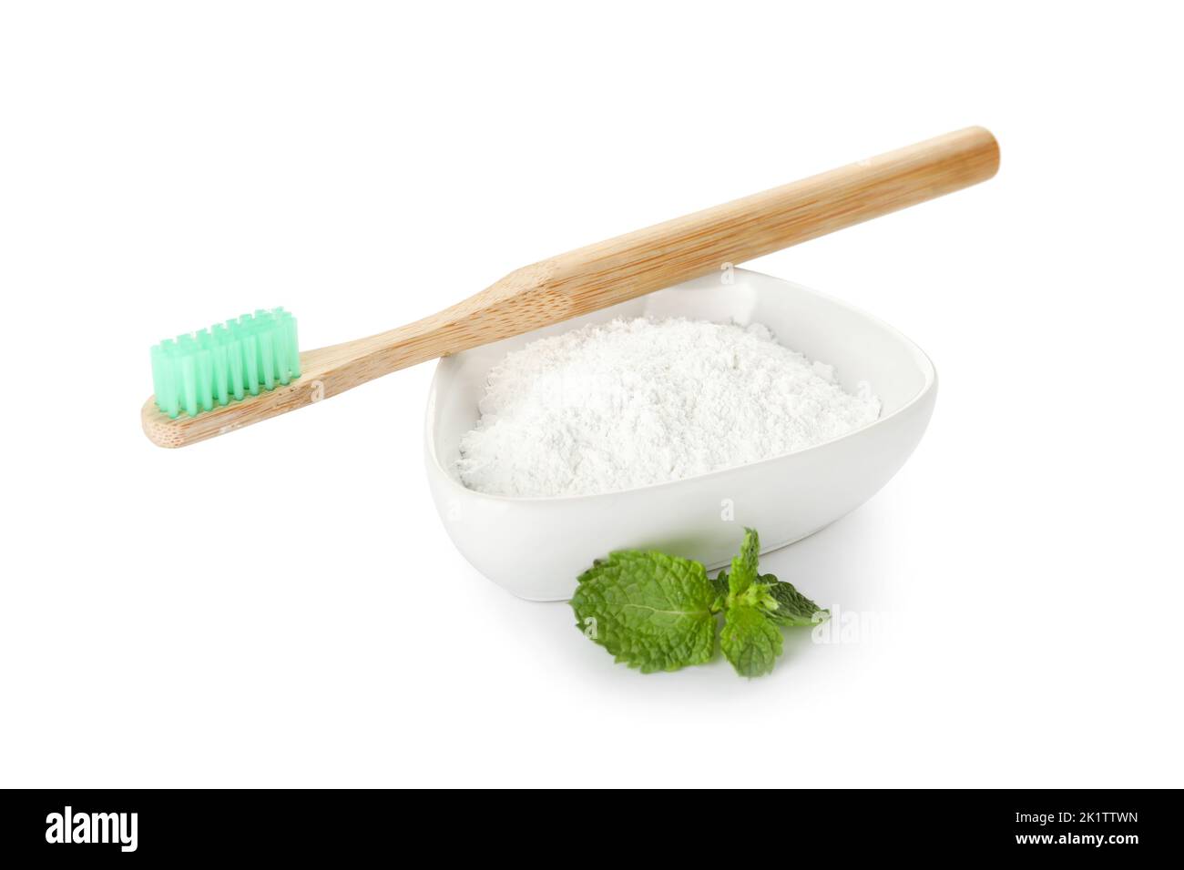 Bowl of tooth powder with mint and brush on white background Stock ...