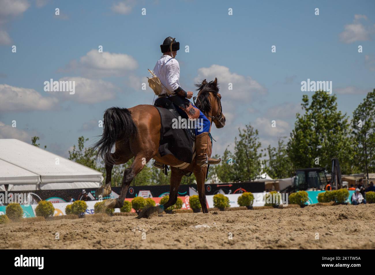 Horseman archer riding in ethnic clothes on horseback Stock Photo - Alamy