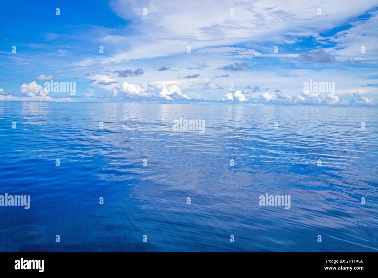 A glassy flat day on the ocean off the island of Yap, Micronesia Stock ...