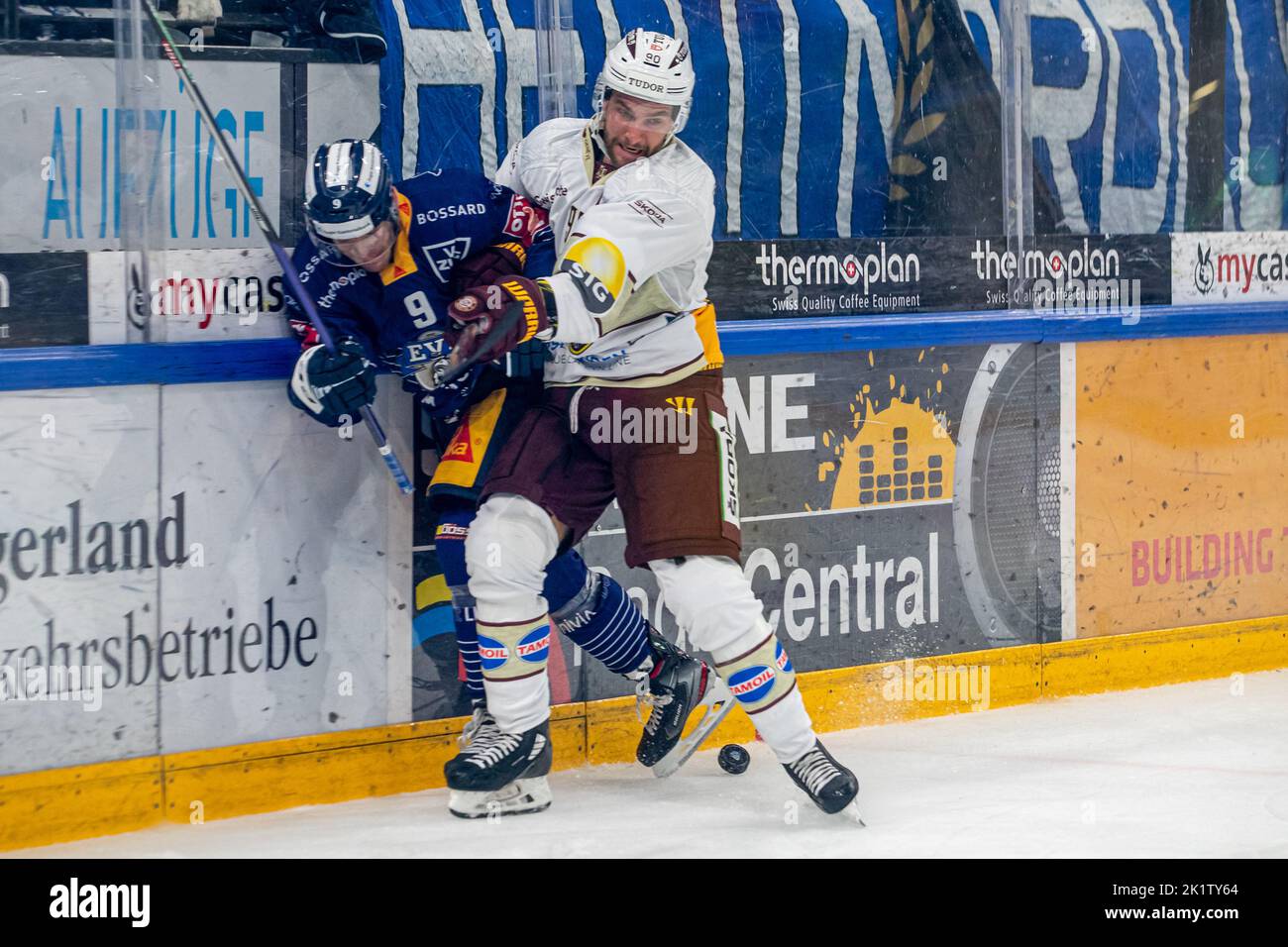 #90 Simon Le Coultre (Geneva) checks Brian O'Neill #9 (EV Zug) during ...