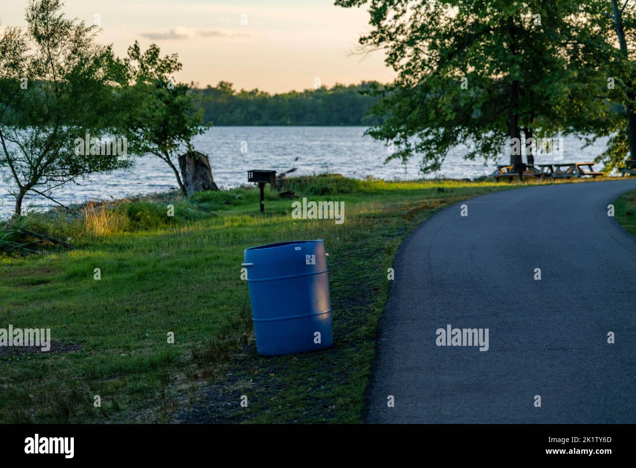 Blue plastic barrel for garbage in a park near Rockland Lake, New York ...